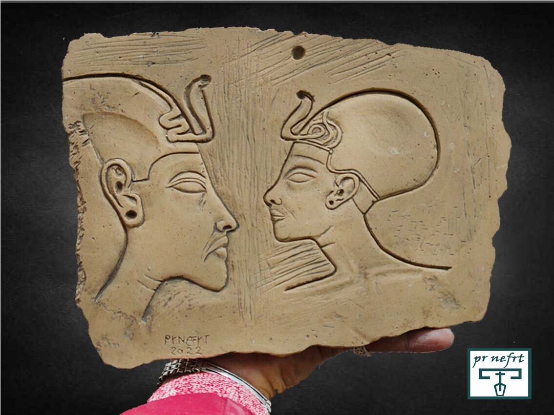 Bas-relief portraying Amenhotep IV Pharaoh tje king Akhenaten, and ...
