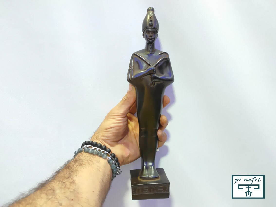 Statue of the idol Osiris. God of resurrection and reckoning, chief of ...