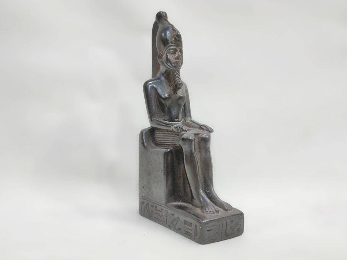 Sitting statue of Osiris.. God of resurrection and reckoning, chief of ...