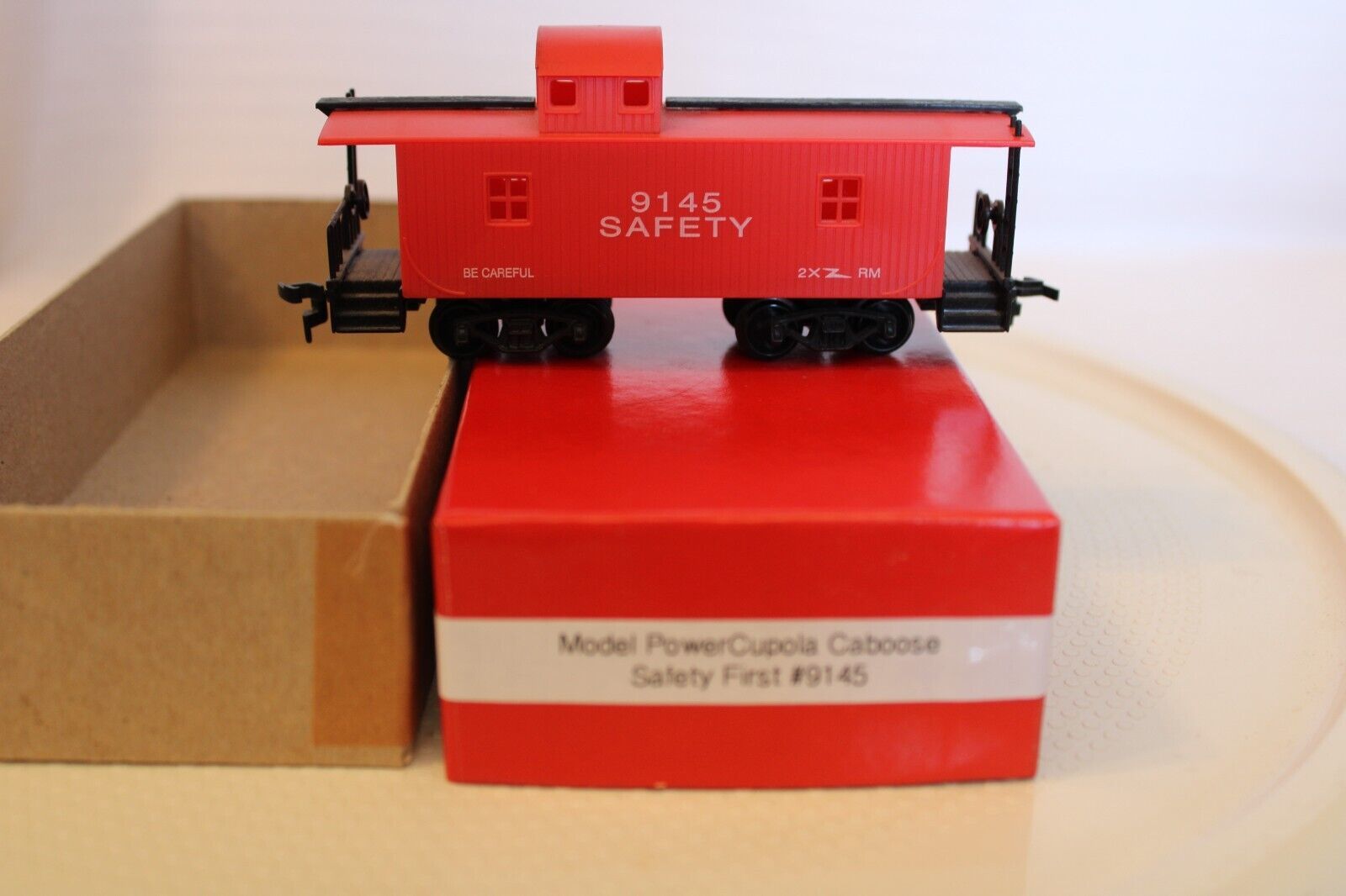 HO Scale Model Power, 33' Caboose, Safety First, Red, #9145Built RTR - Freight Cars