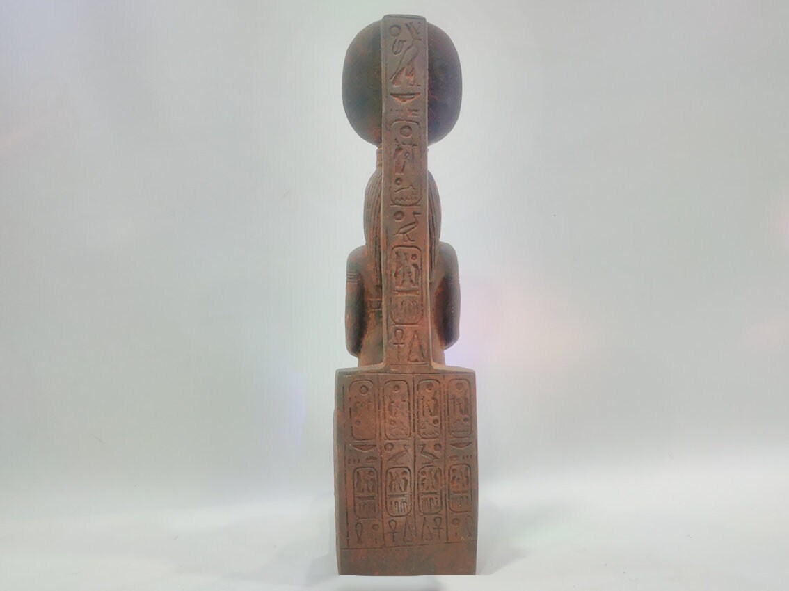 A seated statue of the goddess Sekhmet of solid stone. A rare museum ...