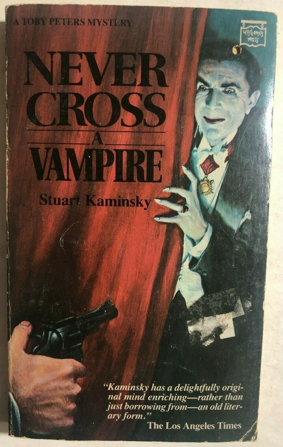 NEVER CROSS A VAMPIRE by Stuart Kaminsky (1984) Mysterious Press ...