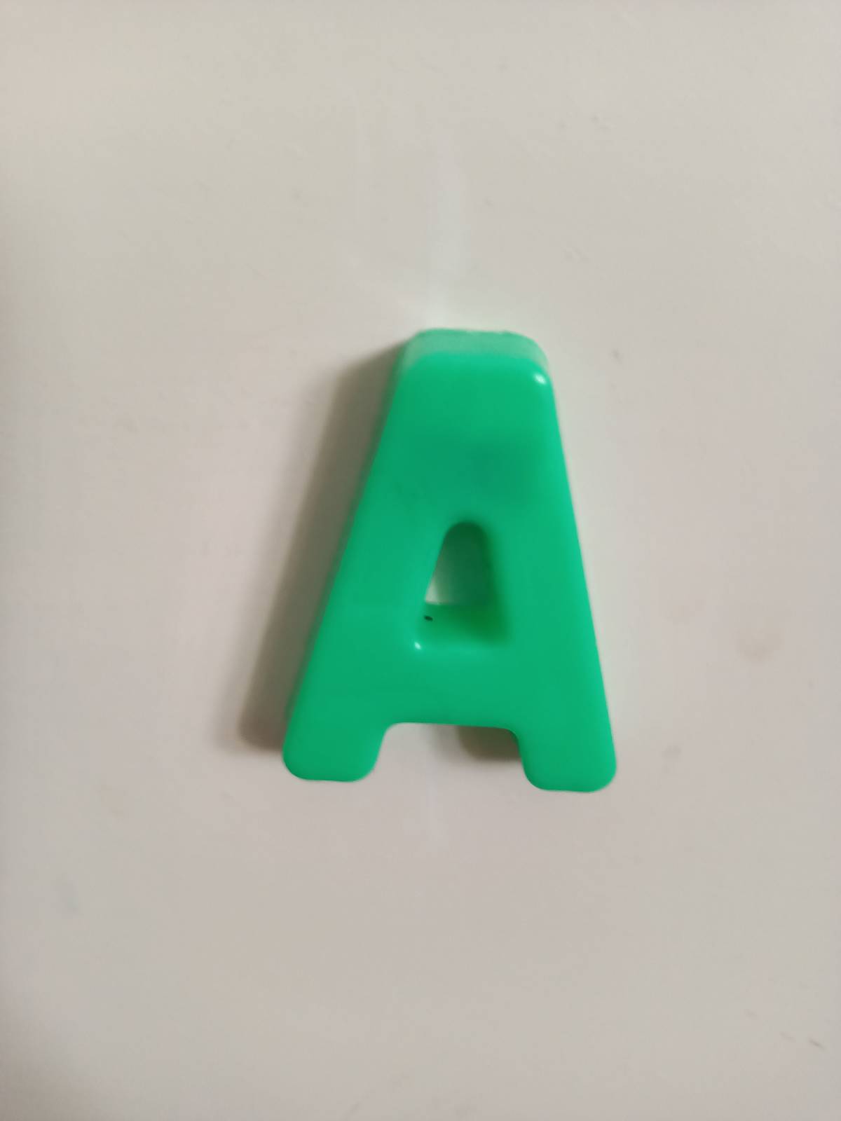 Magnetic plastic alphabets to teach the child letters, syllables and ...