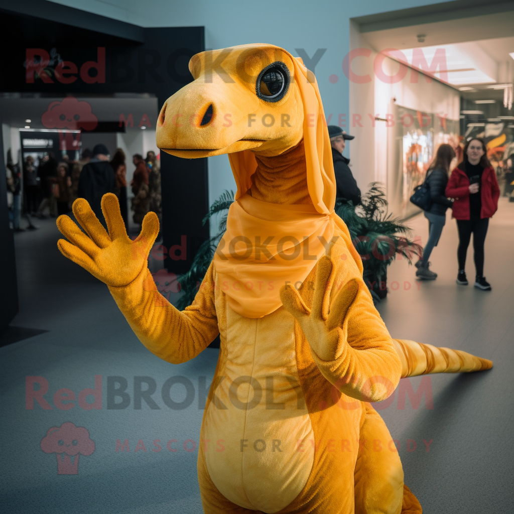 Gold Coelophysis mascot costume character dressed with a Maxi Dress and ...