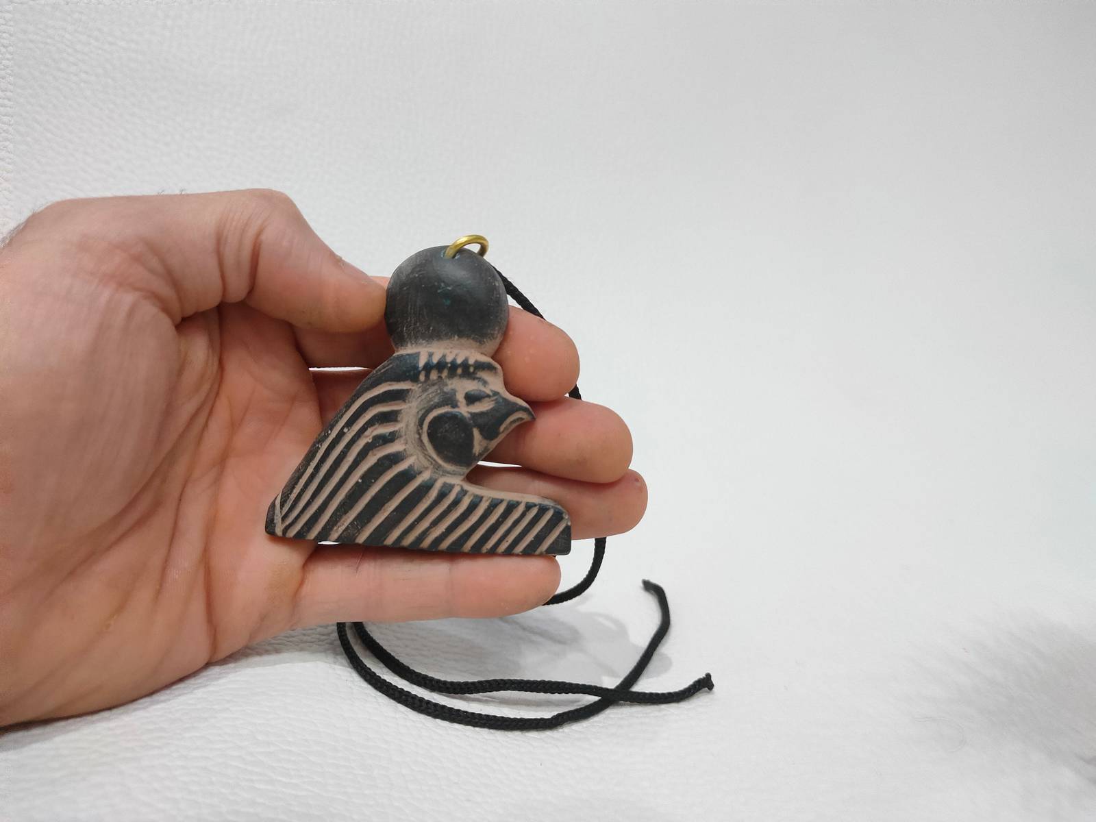 Ra. The god Ra. Amulet of Ra. Egyptian mythology. Ancient Pharaonic art ...