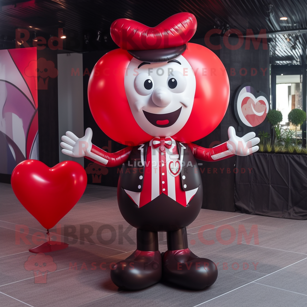 Red Heart Shaped Balloons mascot costume character dressed with a ...