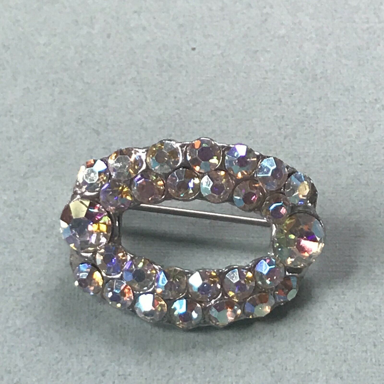 Small Aurora Borealis Rhinestone Pinched Open Oval Silvertone Pin ...