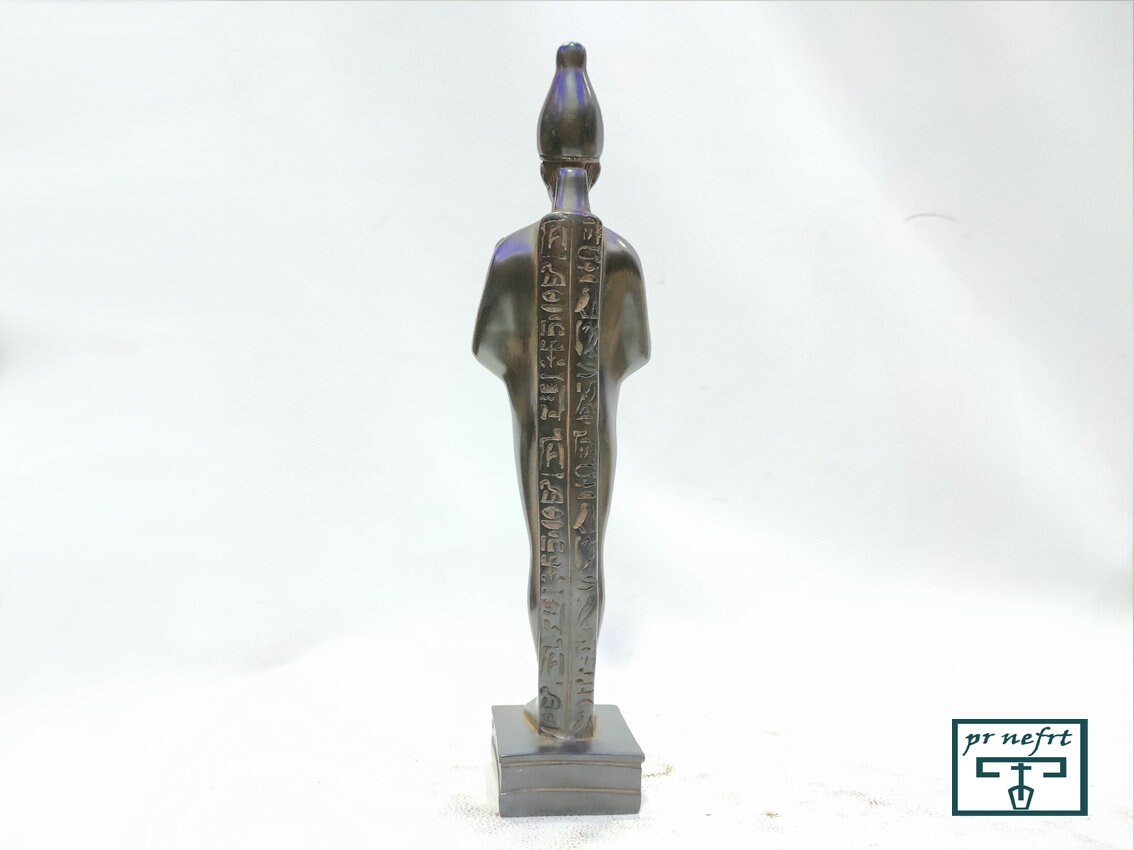 Statue of the idol Osiris. God of resurrection and reckoning, chief of ...
