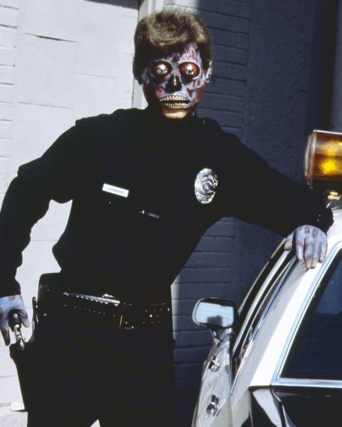 They Live alien cop poses by police car 8x10 and similar items