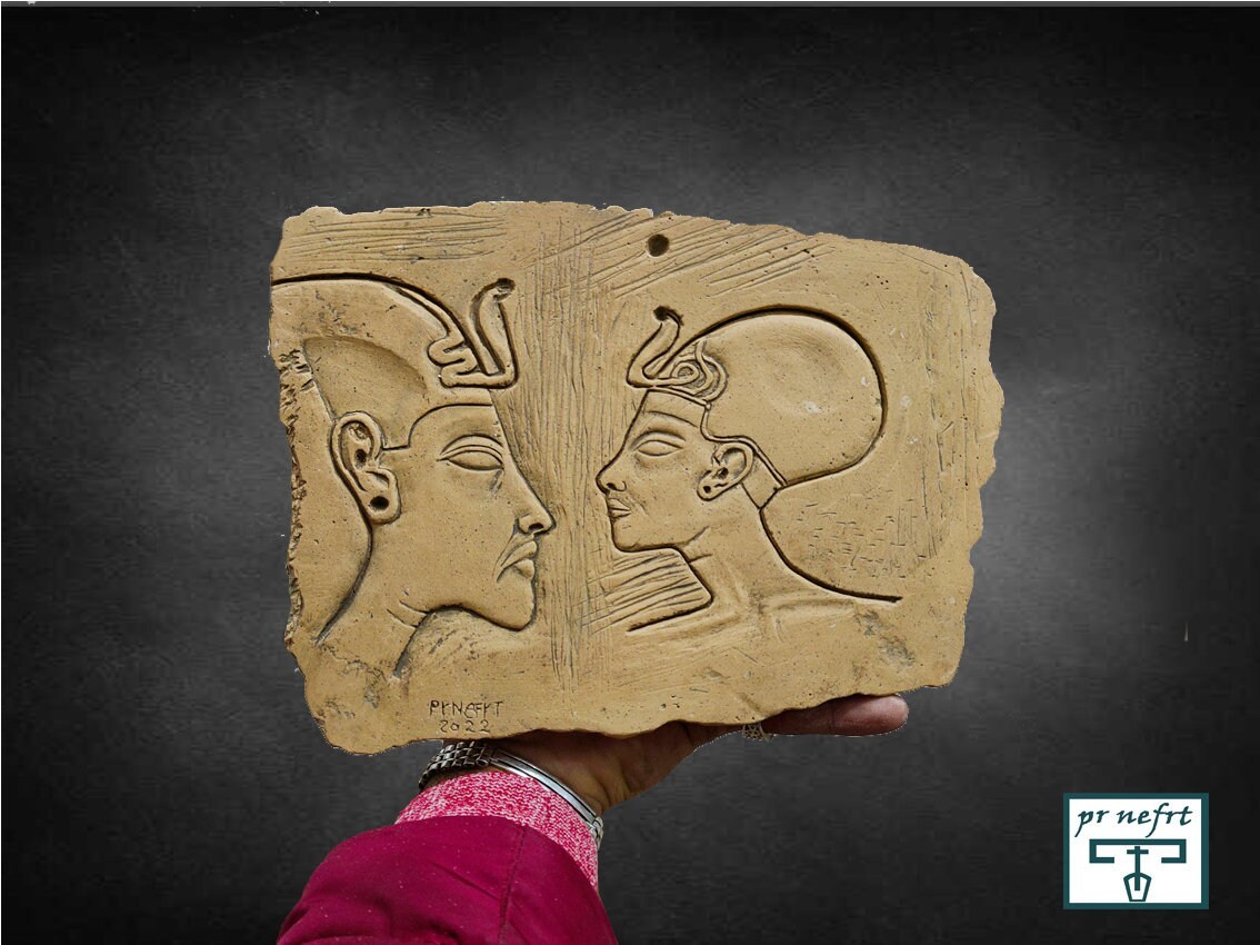 Bas-relief portraying Amenhotep IV Pharaoh tje king Akhenaten, and ...