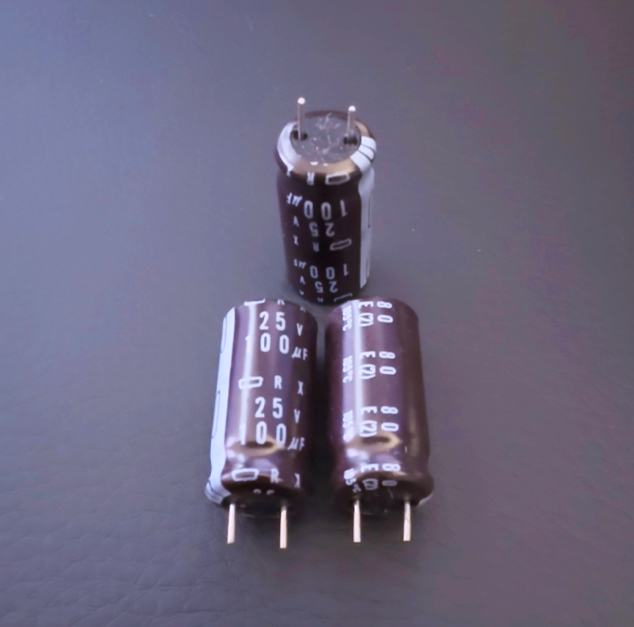 10Pcs Chemi-Con Nippon RX 100uF 25V 10x20 Electrolytic PC Pin Capacitor ...
