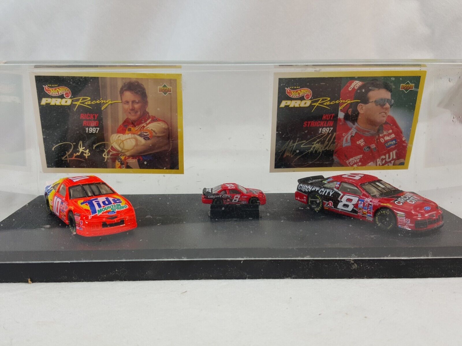 Three Nascar Diecast Cars in display case Ricky Rudd & Hut Stricklin ...