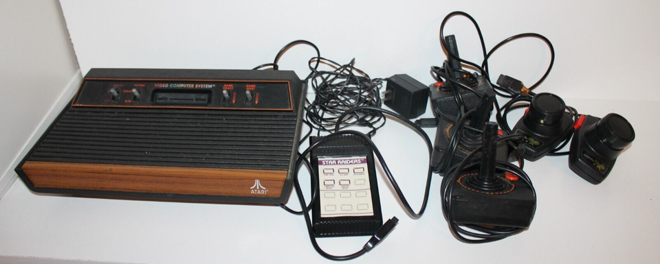 Atari 2600 Console System with Controllers Paddles Wood Grain - Video ...