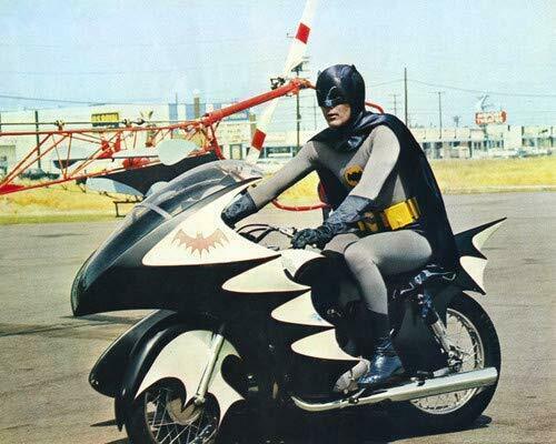 Adam West in Batman sitting on Batcycle parked near Batcopter 16x20 ...